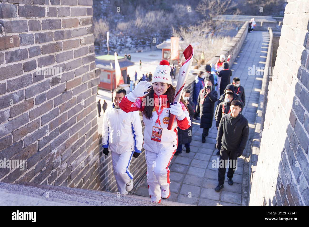 Beijing, China. 3rd Feb, 2022. Torch bearer Chen Ruolin runs with the torch during the Beijing ...