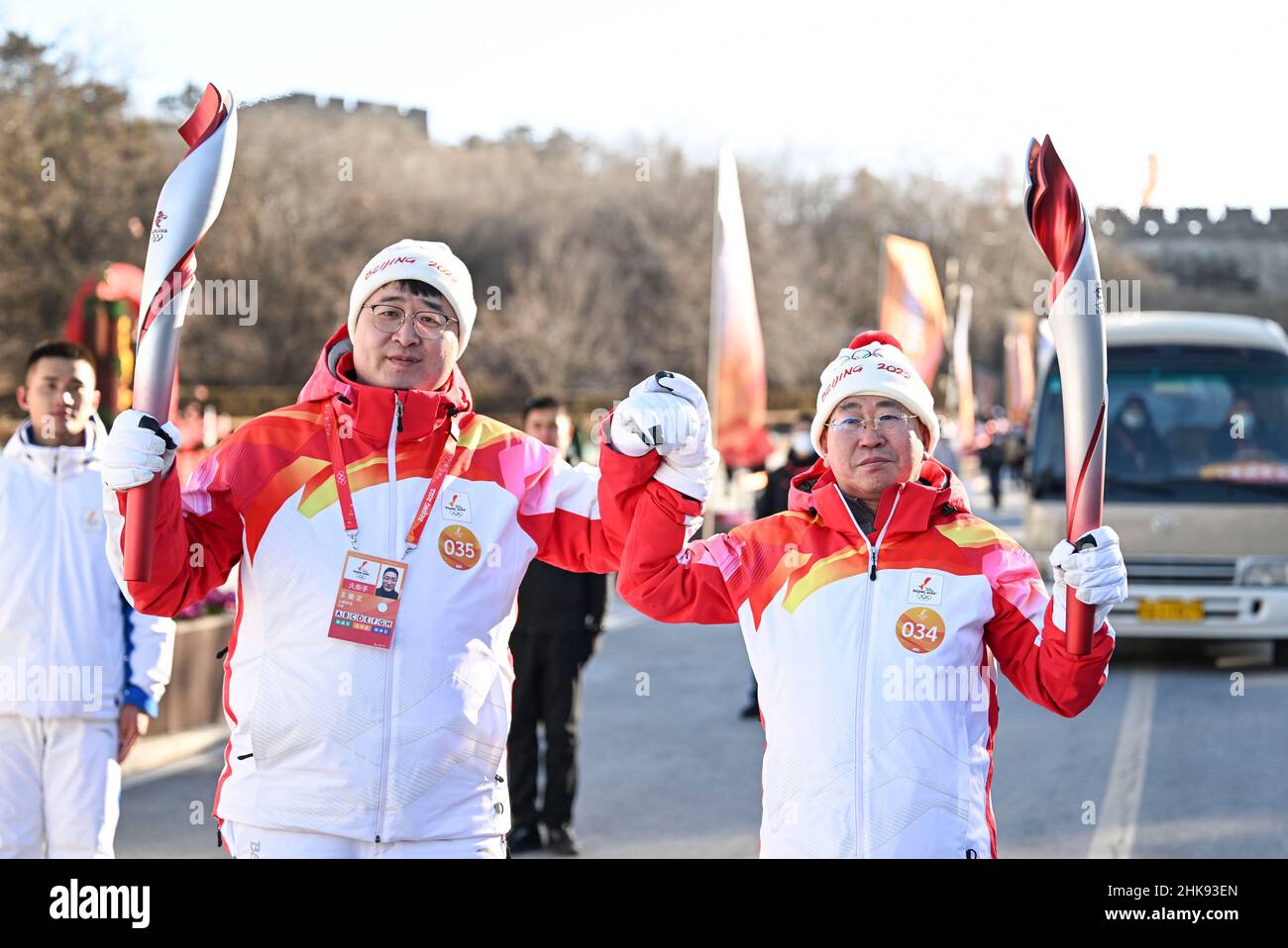 Beijing, China. 3rd Feb, 2022. Torch bearers Wang Guozheng (L) and Wang Jinming attend the ...