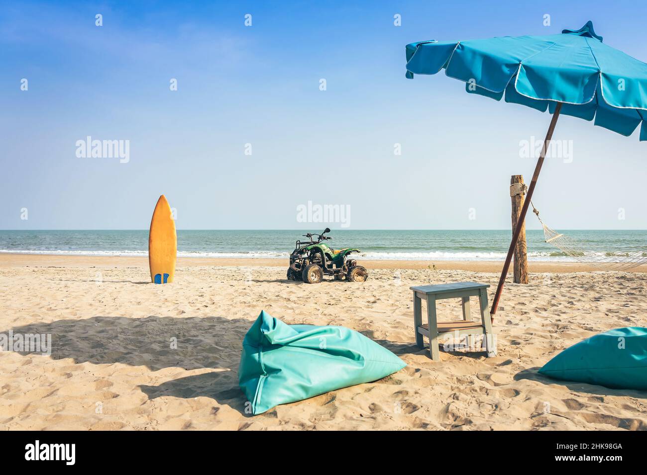 Vintage green ATV on the sandy beach. Quad ATV all terrain vehicle ...