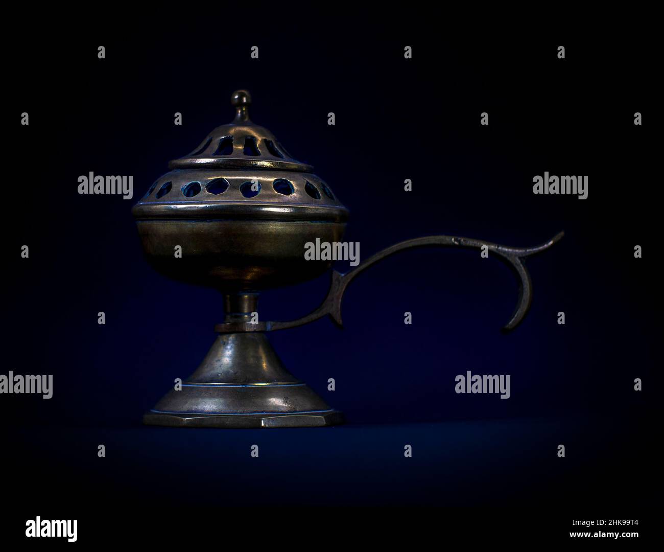 Antique brass bronze hand burner censer Stock Photo - Alamy