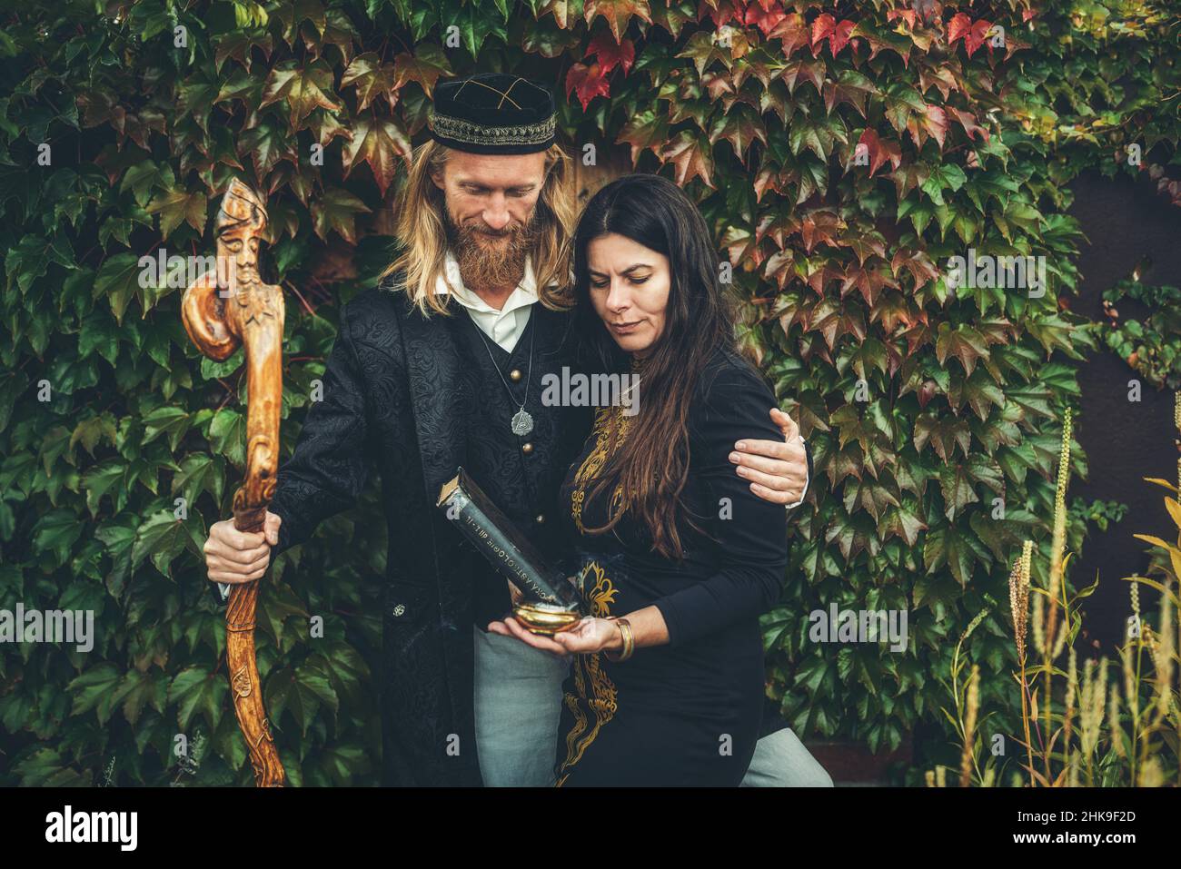 Alchemist in a beautiful ornamental dress in nature Stock Photo - Alamy