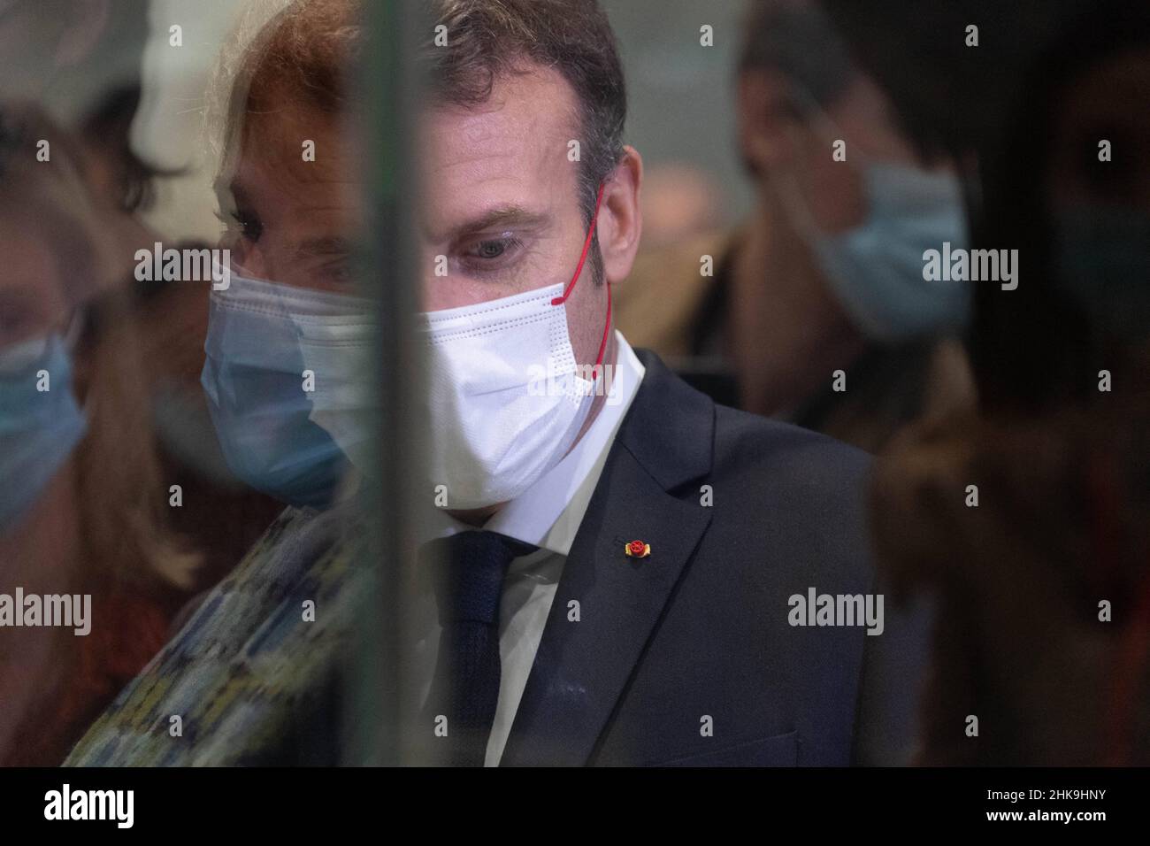 President Emmanuel Macron looks at items from ancient Egypt installed ...