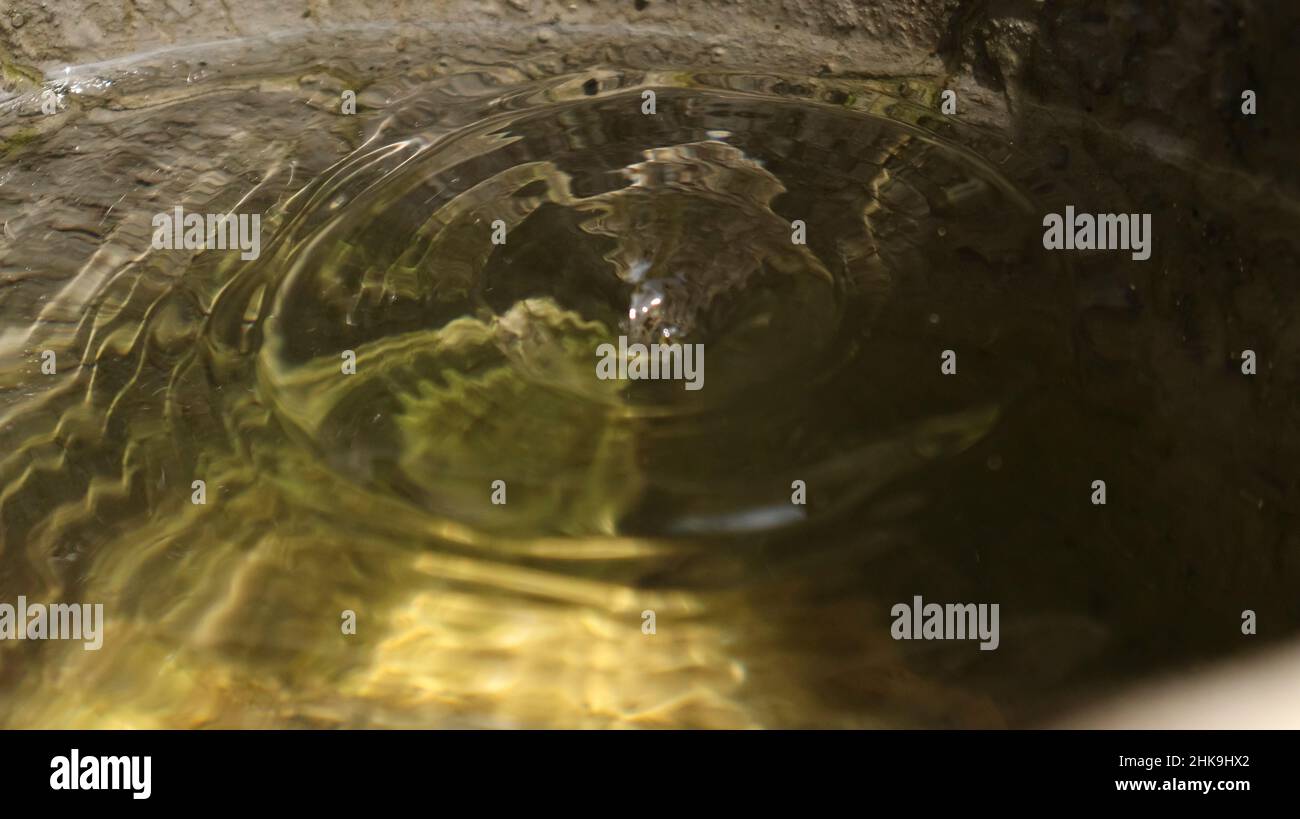 center Circular water dim water. Pure water vibration Stock Photo - Alamy
