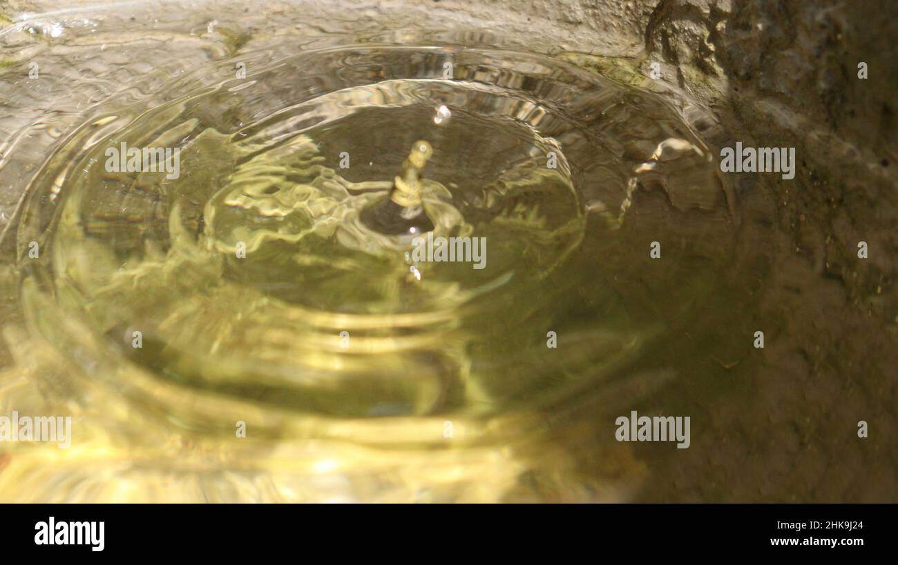 Circular dim water. Pure water vibration Stock Photo - Alamy