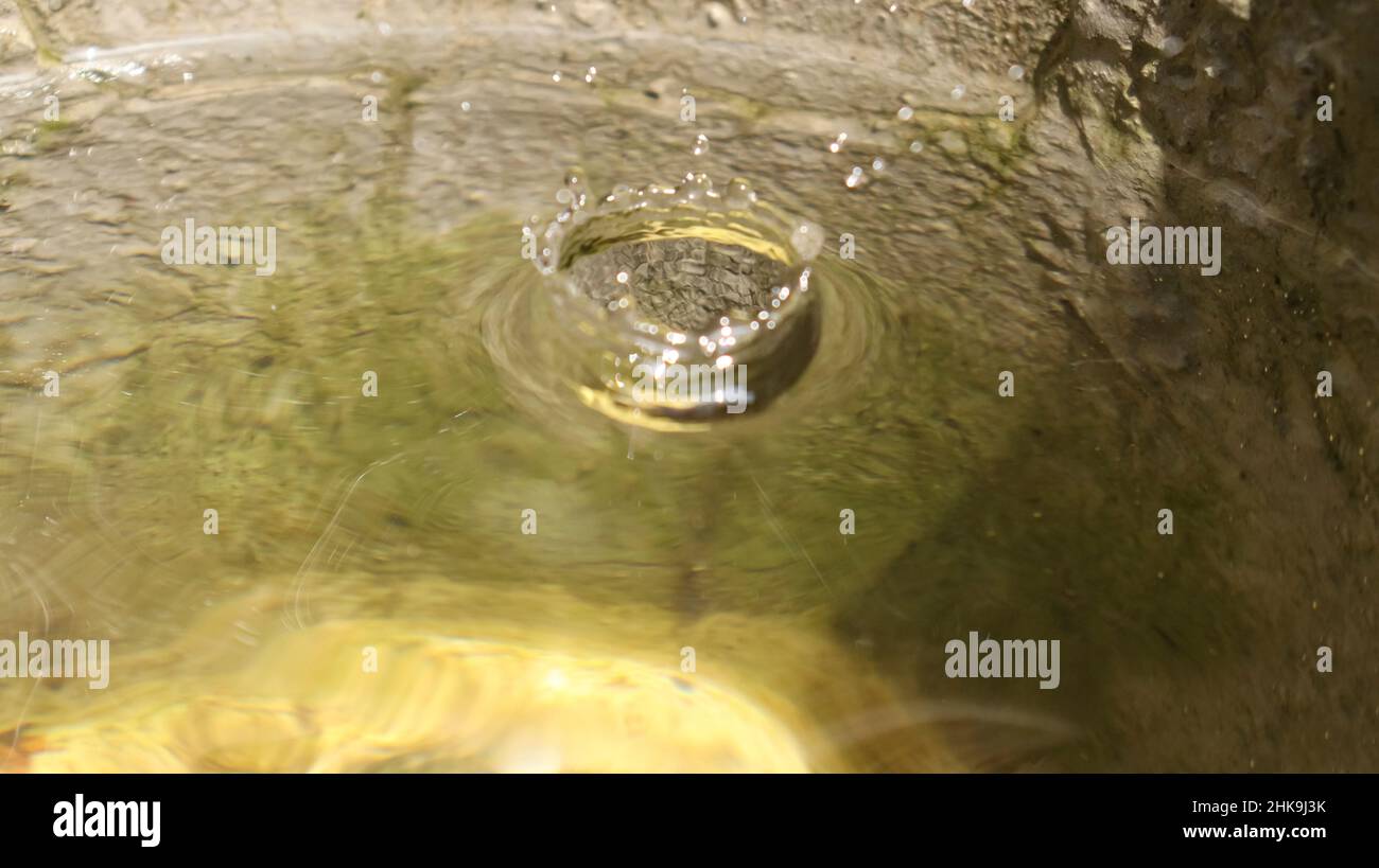 Circular dim water. Pure water vibration Stock Photo - Alamy