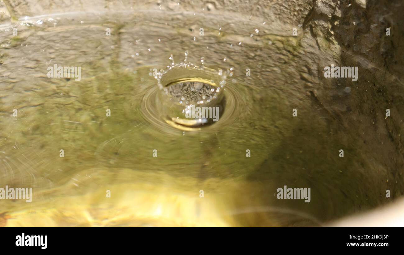 Circular dim water. Pure water vibration Stock Photo - Alamy