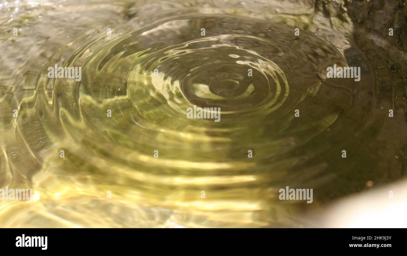 Circular dim water. Pure water vibration Stock Photo - Alamy