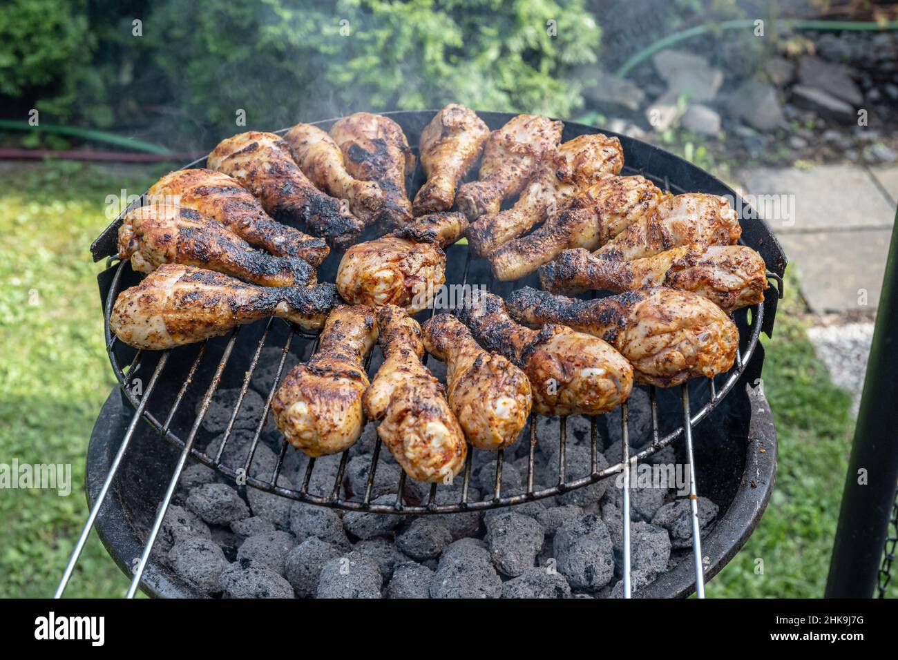 Cooking barbecue chicken wings coal on grill glowing coals bbq in the ...