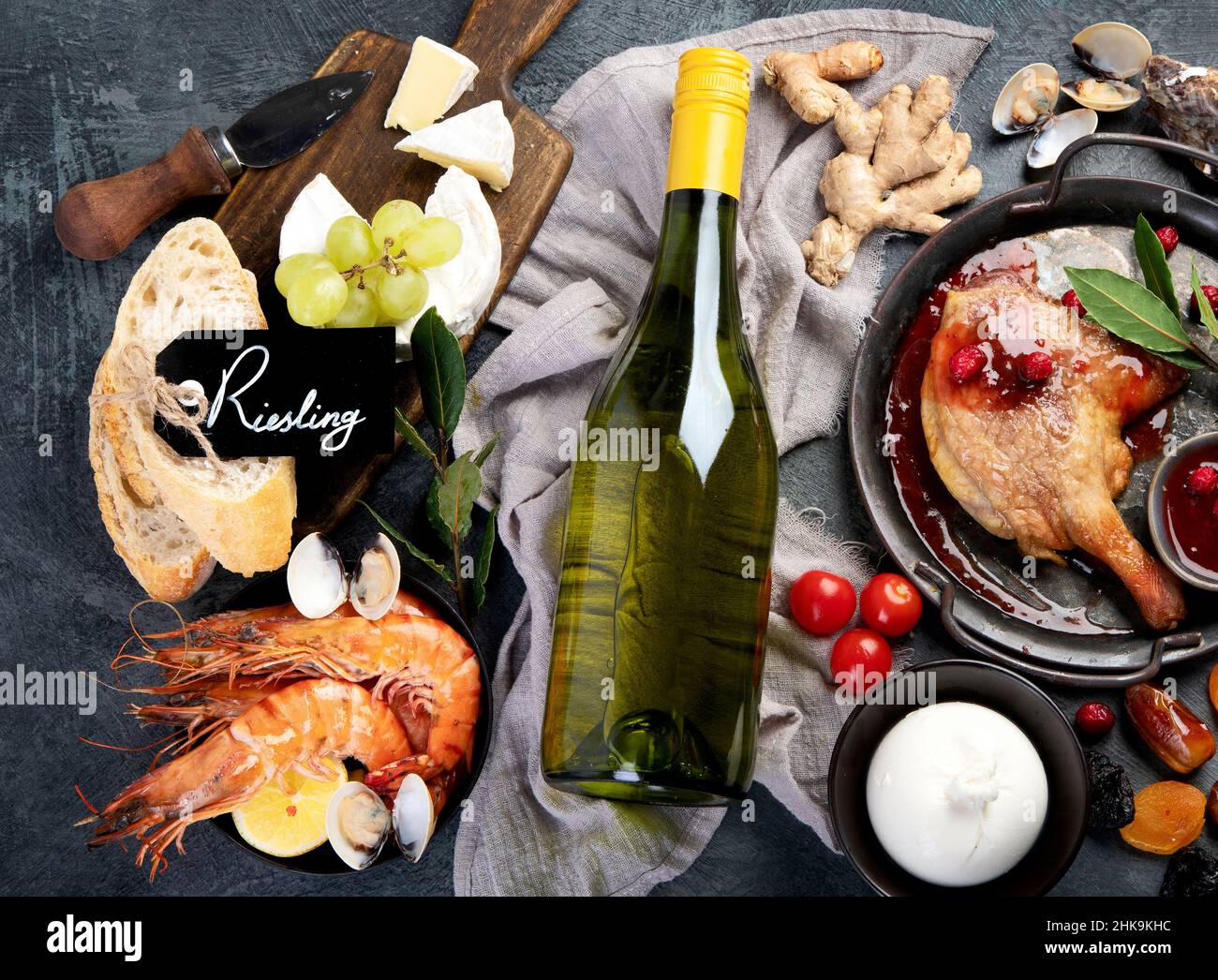 White wine Riesling with duck and snacks. Traditional alcohol drinks ...