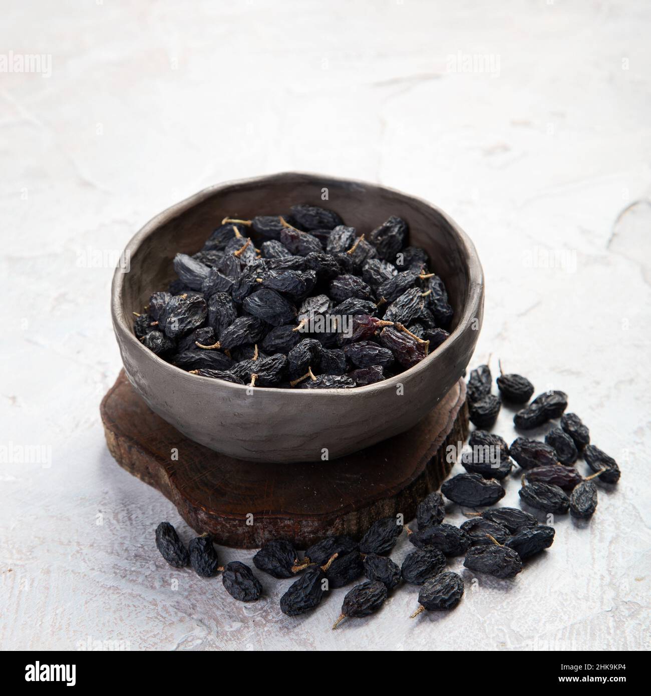 Dark raisins on light background. Dried Fruits Stock Photo - Alamy