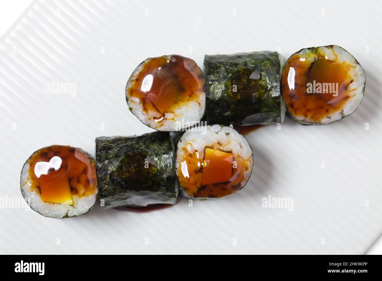 Traditional japanese avocado sushi roll with soya sauce. As a whole ...