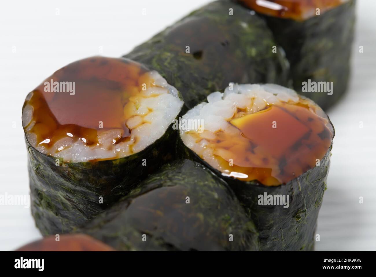 Traditional japanese avocado sushi roll with soya sauce. As a whole ...