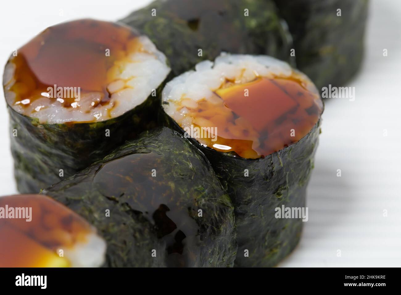 Traditional japanese avocado sushi roll with soya sauce. As a whole ...