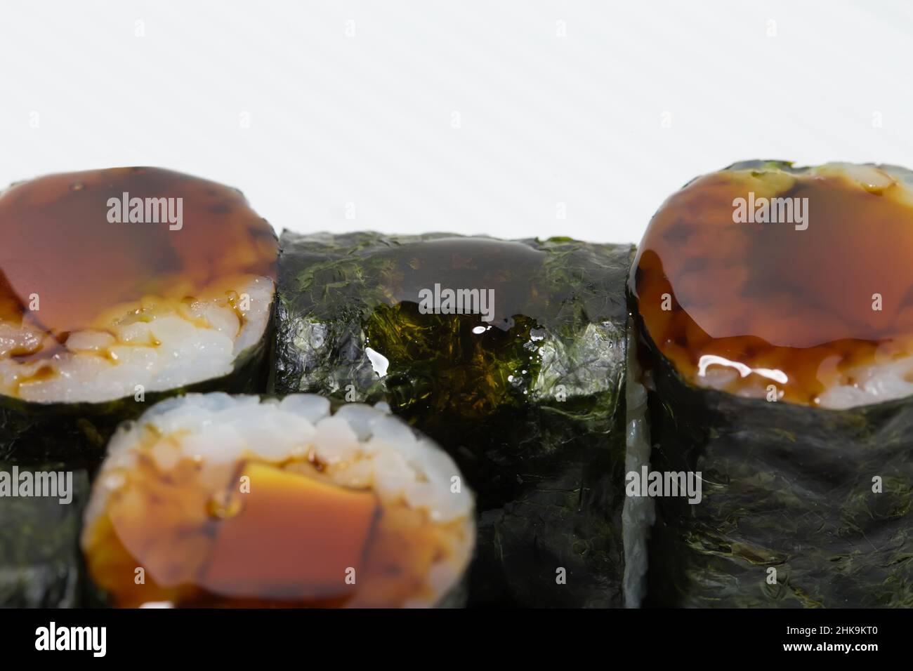 Traditional japanese avocado sushi roll with soya sauce. As a whole ...