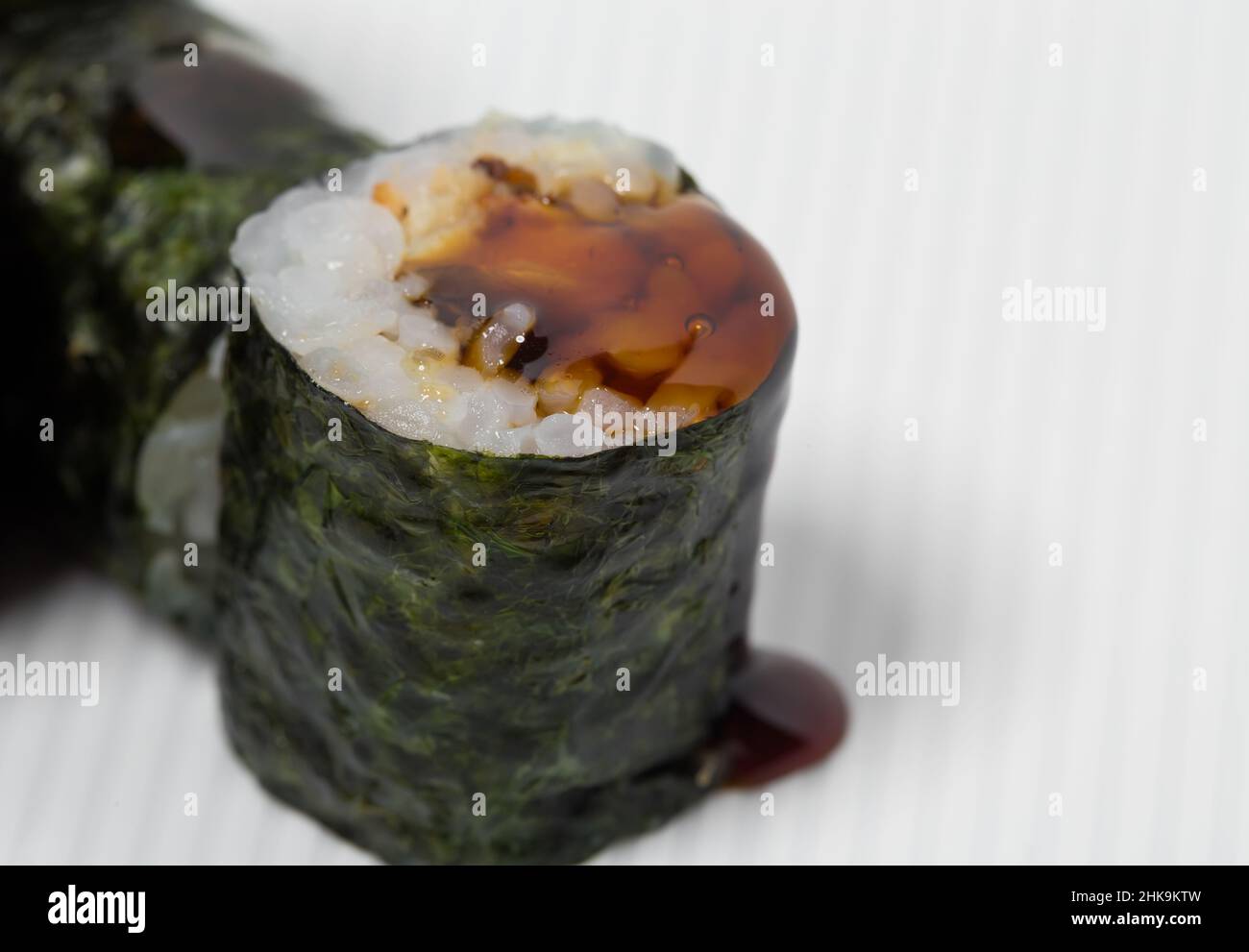 Traditional japanese maki unagi roll. As a whole background Stock Photo - Alamy