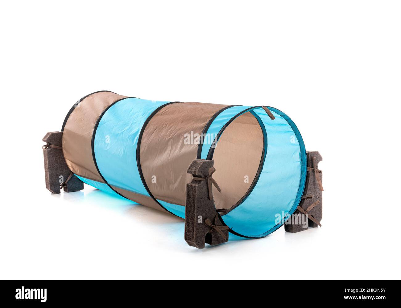 agility tunnel in front of white background Stock Photo - Alamy