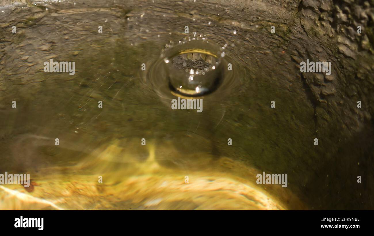 Circular dim water. Pure water vibration Stock Photo - Alamy