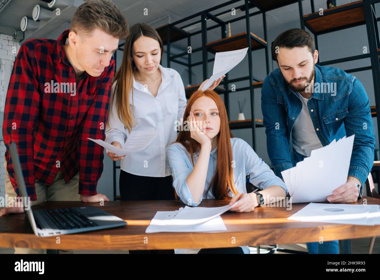 Exhausted exhausted young businesswoman under stress at office sitting ...