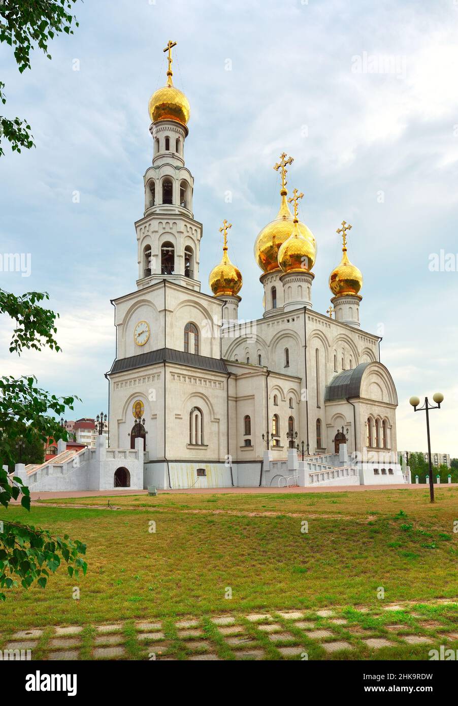 The high bell tower and golden domes of the temple in the Russian ...