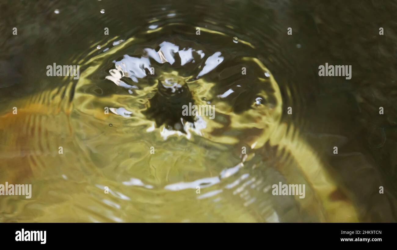 Circular dim water. Pure water vibration. With a background of water ...