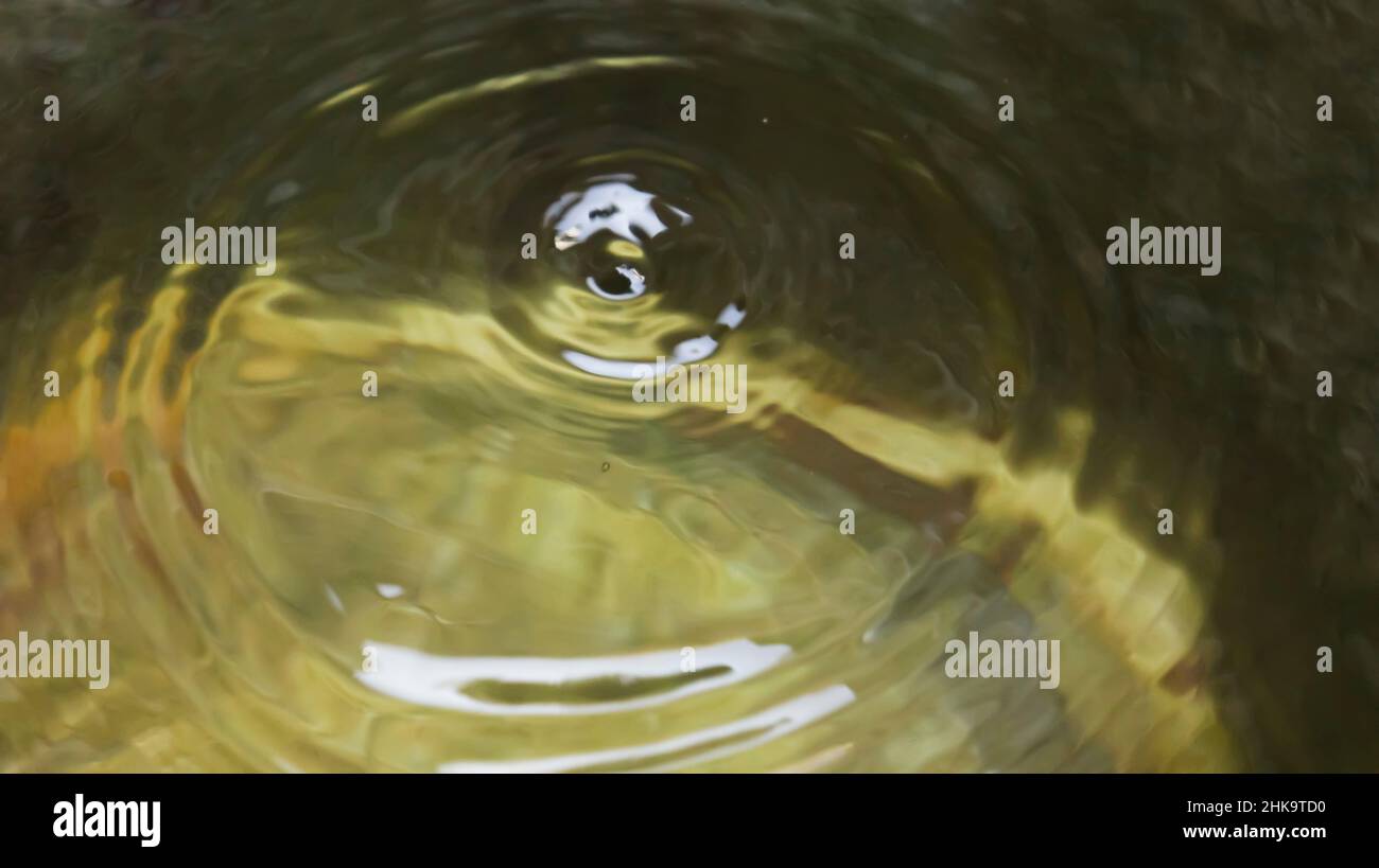 Circular dim water. Pure water vibration. With a background of water ...