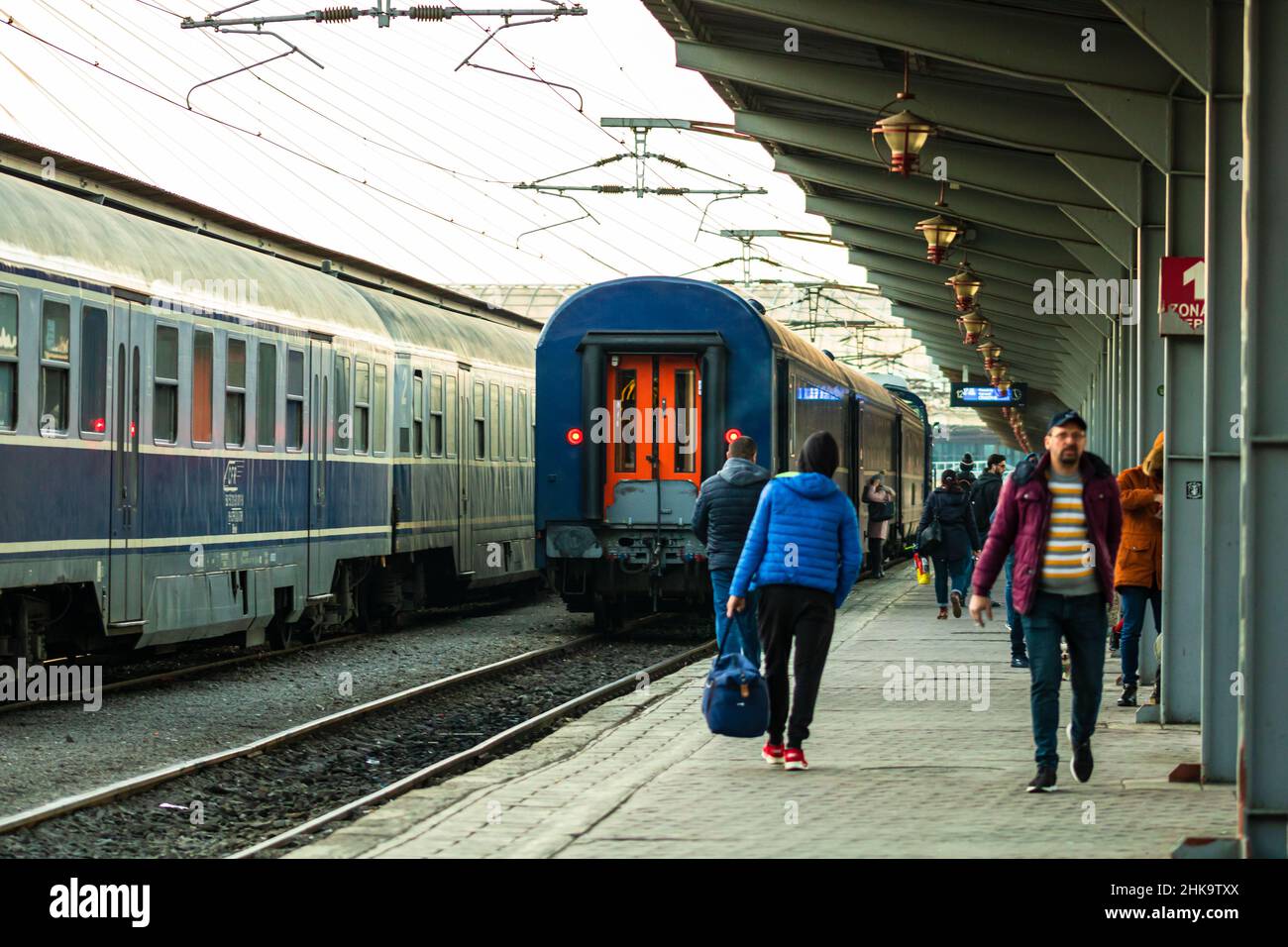 Train in motion or at train platform at Bucharest North Railway Station ...