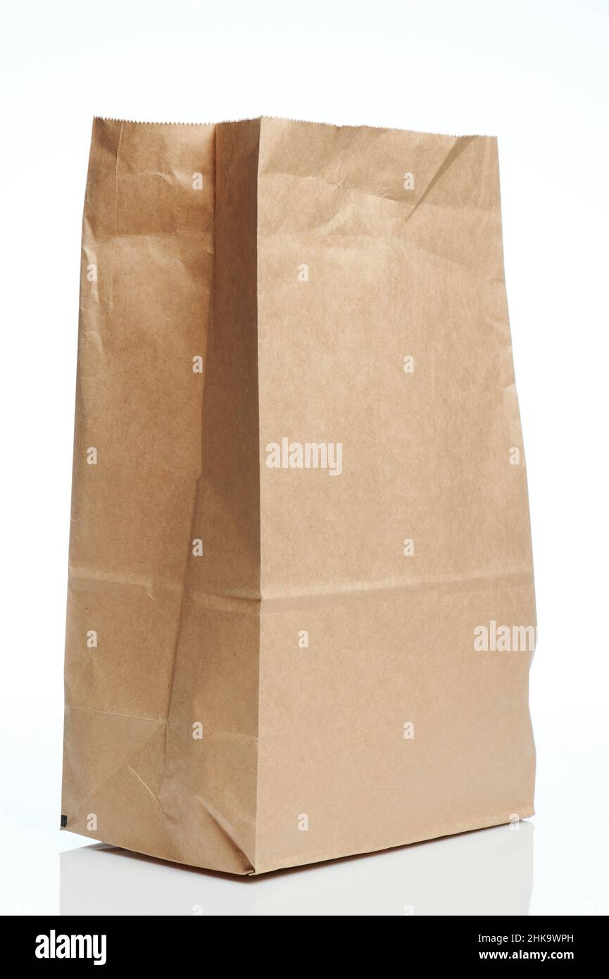 Packing brown paper bag isolated on white studio background Stock Photo ...