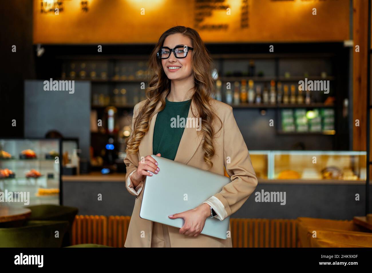 Business Woman Restaurant Owner With Laptop In Hands Dressed Elegant ...