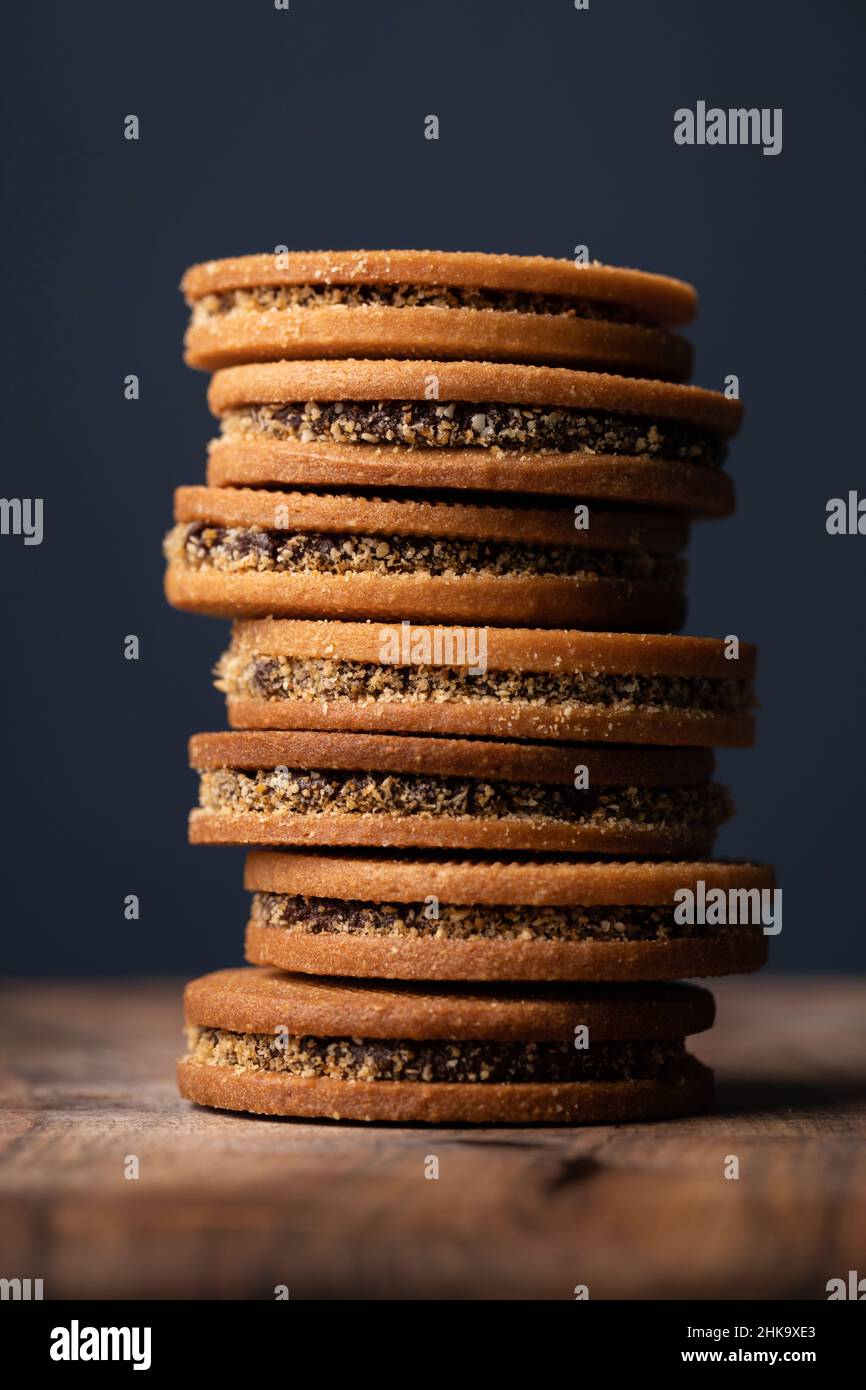 Stack of biscuit sandwiches with chocolate filling Stock Photo - Alamy
