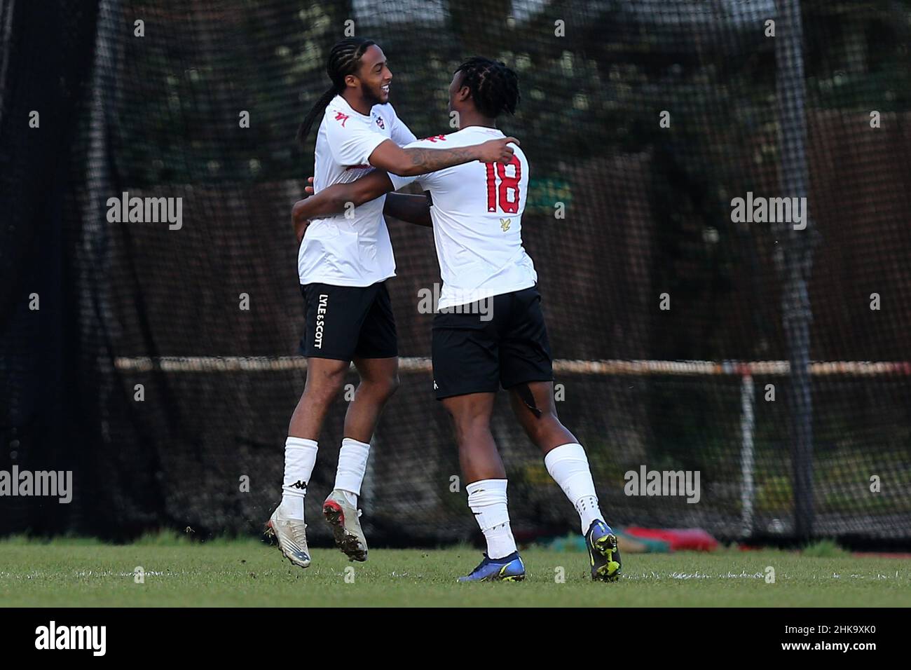 Deshane Dalling of Lewes (R) scores the first goal for his team and ...