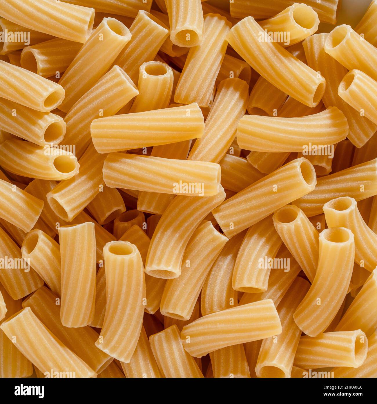 raw pasta rigatoni top view. Macaroni pasta background. Carbo food ...