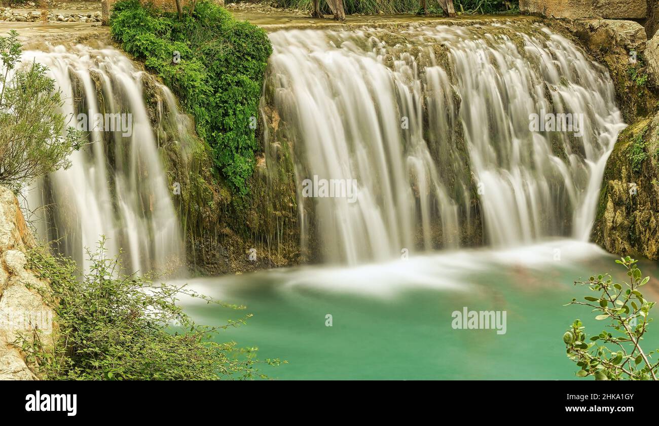 Beautiful view of a water flowing downstream from a waterfall Stock ...