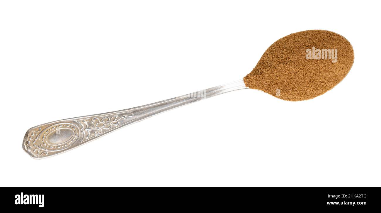 top view of silver spoon with soluble ground roasted chicory root ...