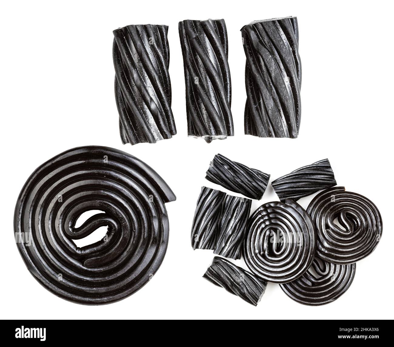 set of various black liquorice candies isolated on white plate Stock ...