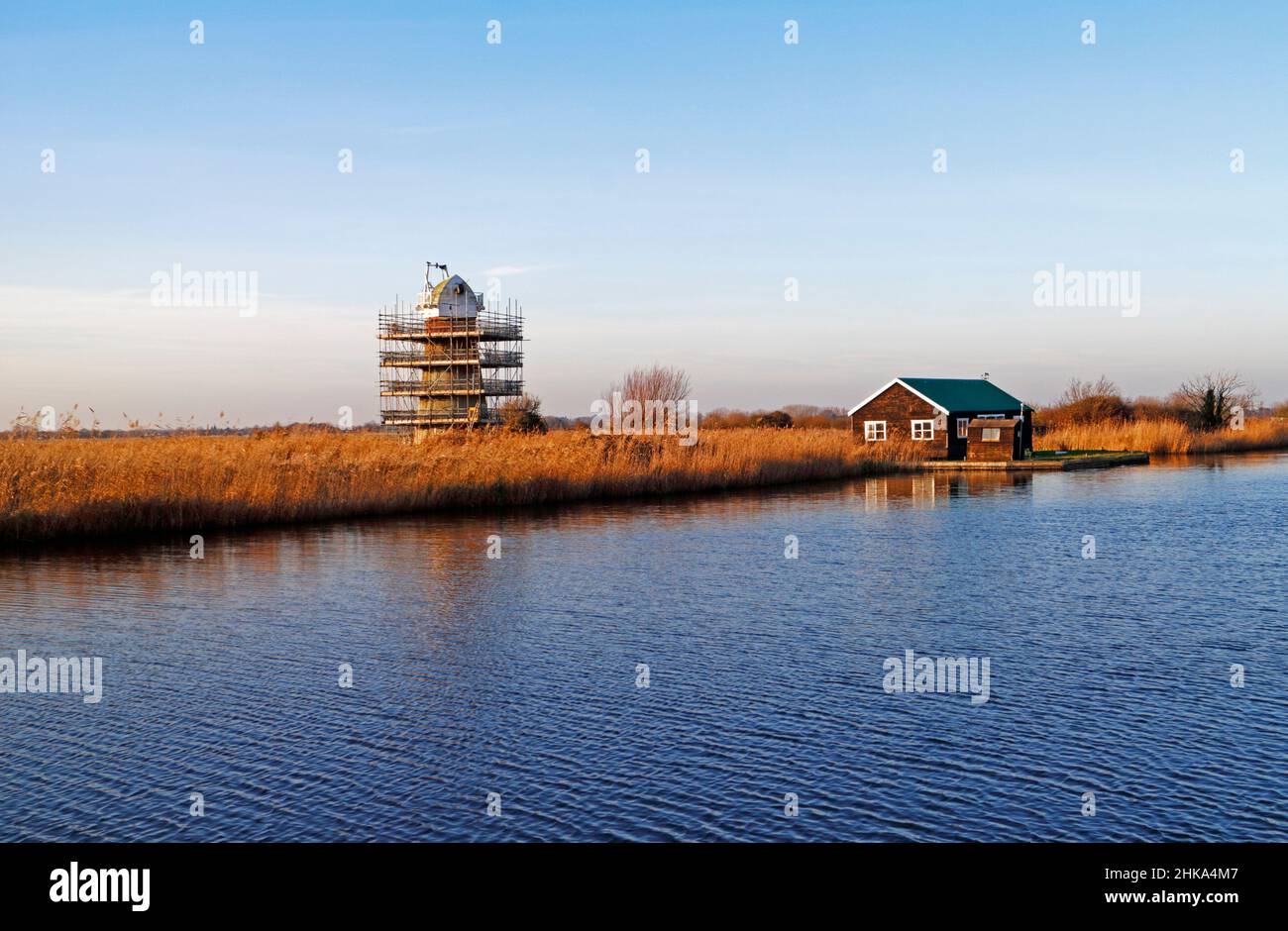 A view over the River Thurne to Horning Marshes and mill in restoration ...