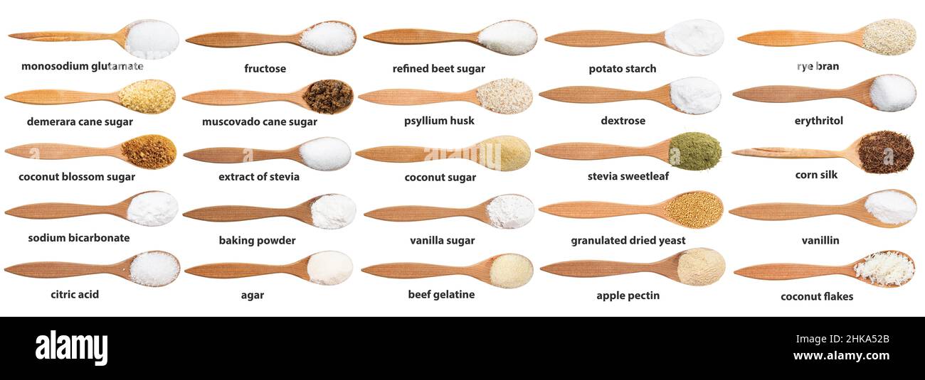 set of top view of wooden spoon with various cooking enhancers with ...