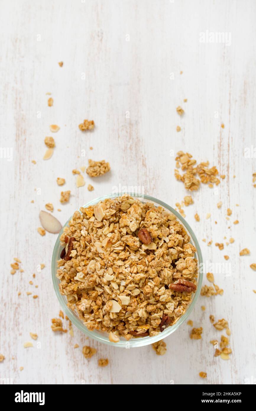 granola in bowl on white background Stock Photo - Alamy