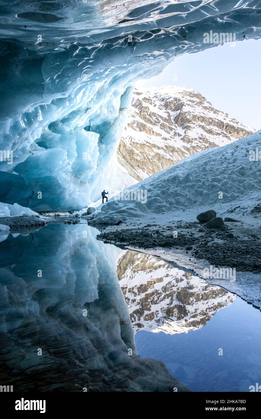 Ice cave exploration in Zinal glacier Stock Photo - Alamy