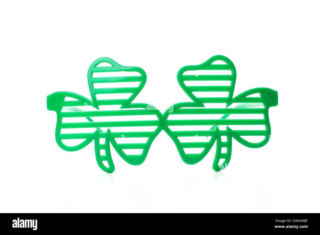Clover leaf glasses isolated on white background Stock Photo - Alamy