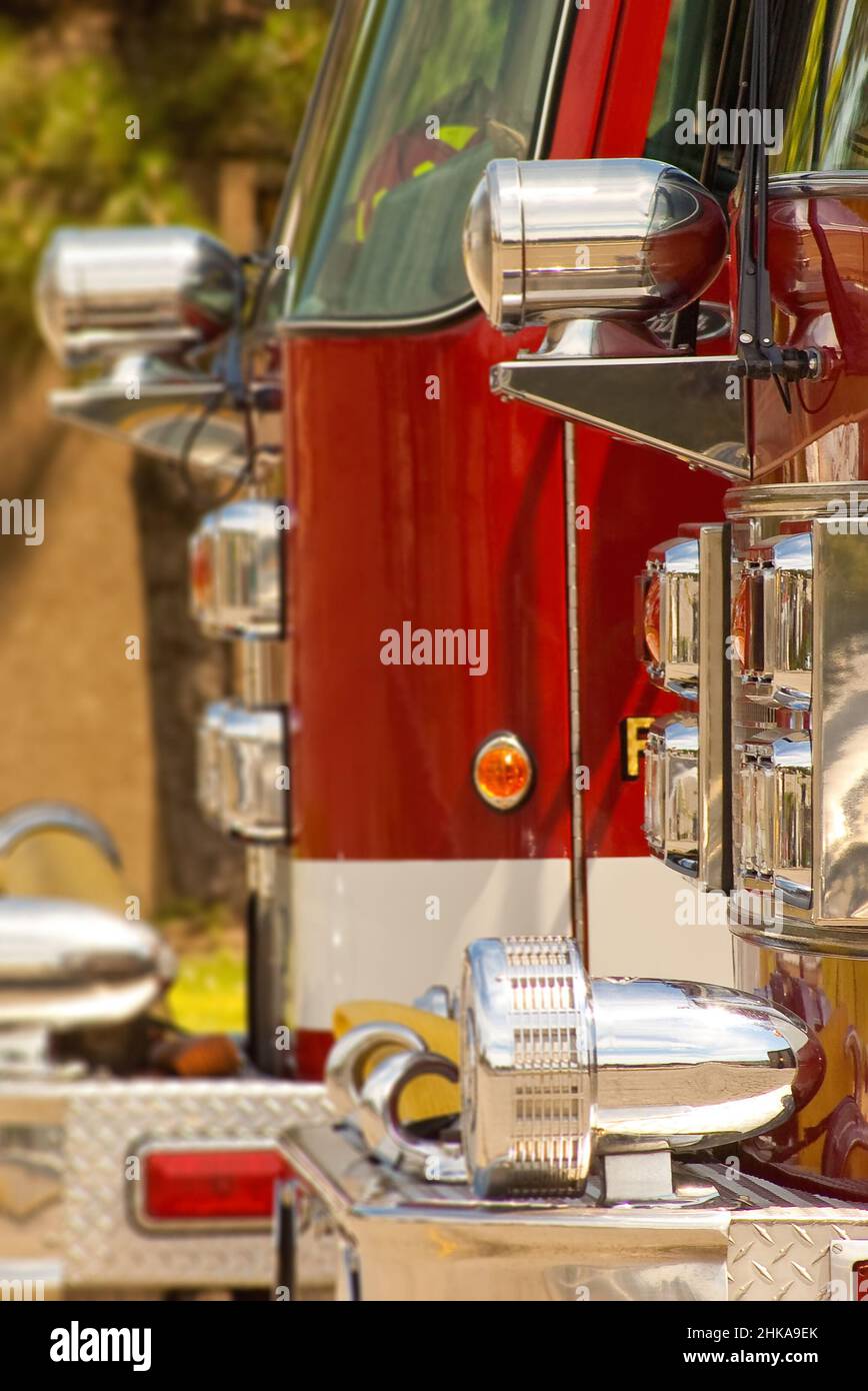 Local fire department red engines on stand by Stock Photo - Alamy