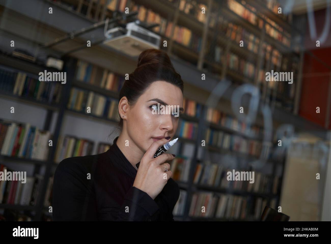 Woman writing code on glass hi-res stock photography and images - Alamy