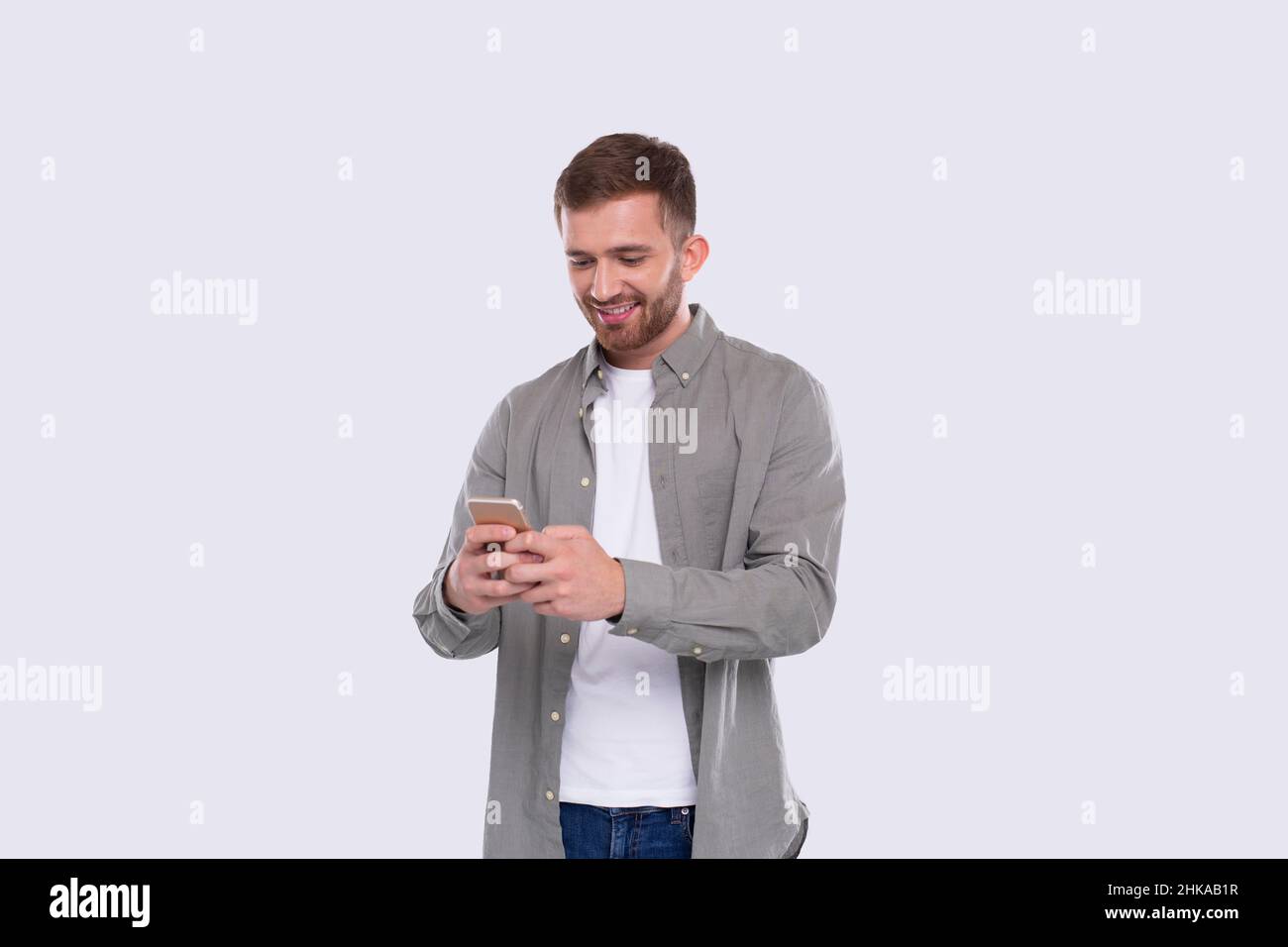 Man Standing Using Phone Isolated. Man Texting on Phone. Technology ...