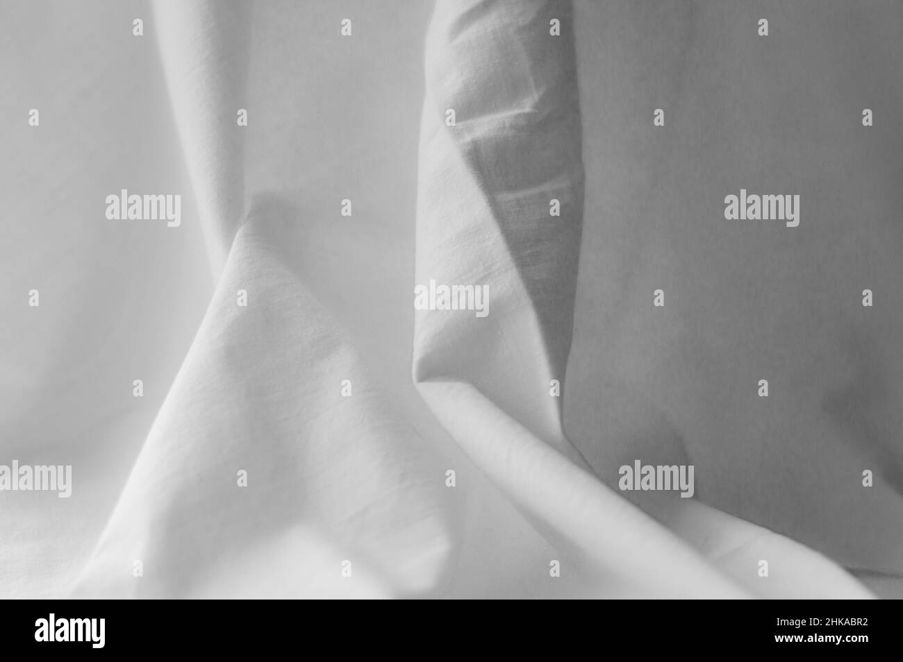 White linen abstract folded texture background Stock Photo - Alamy