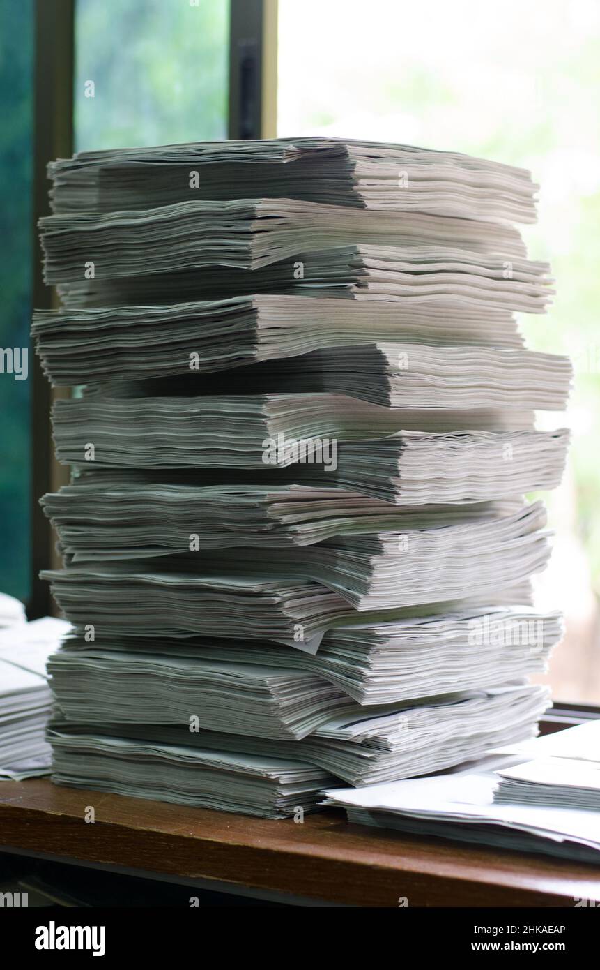 A stack of work papers in an office Stock Photo - Alamy