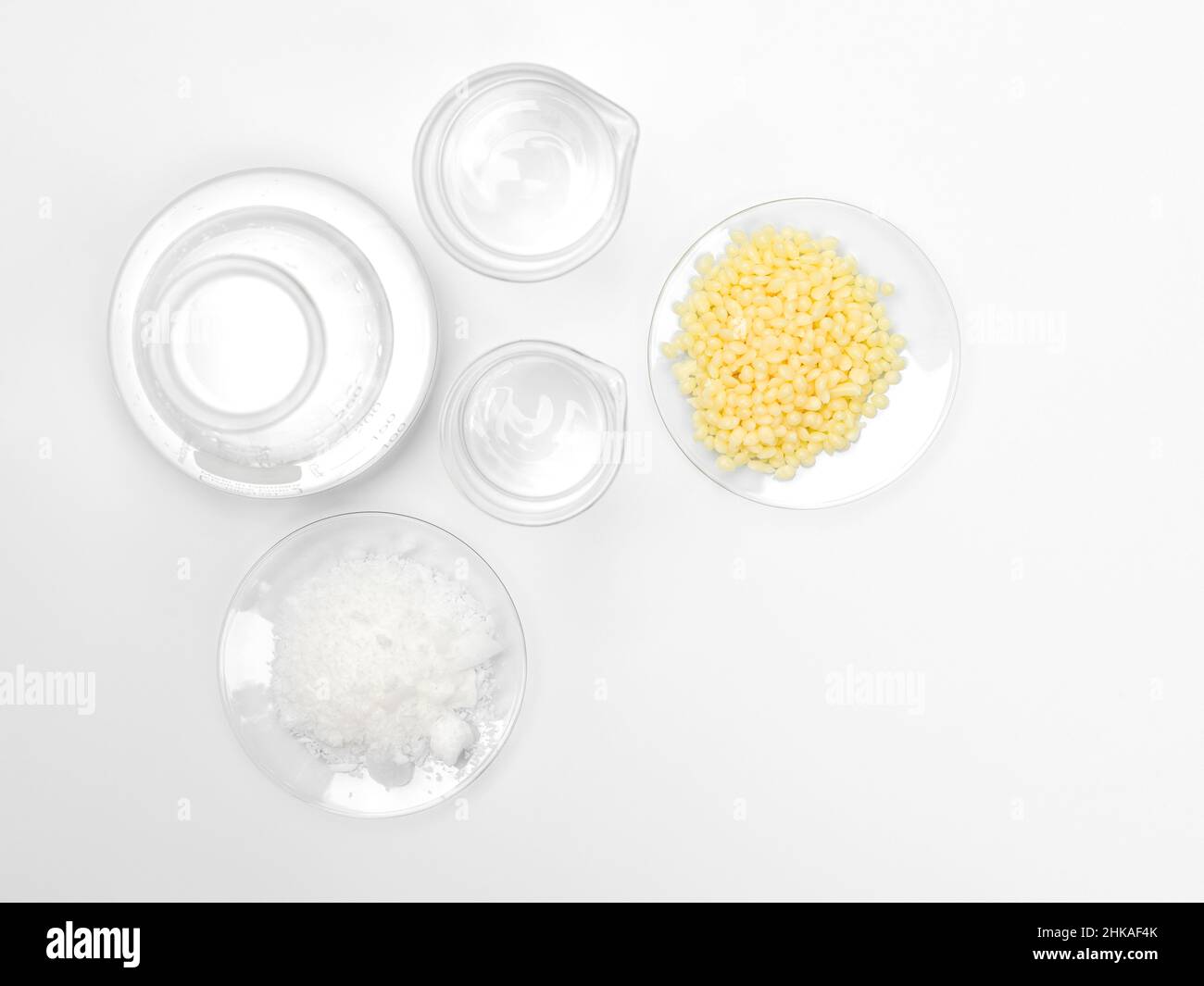 Cosmetic chemicals ingredient on white laboratory table. Cetyl esters ...