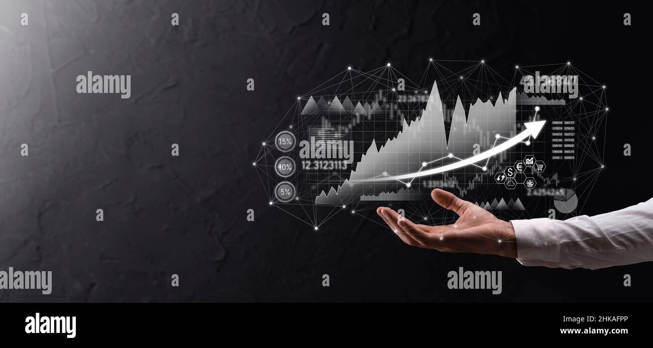 Hand hold sales data and economic growth graph chart. Business planning ...