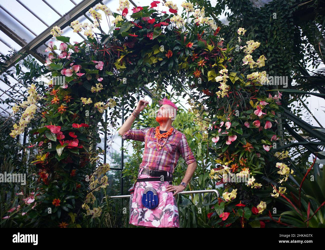 Henck Roling, in-house florist at Kew, poses with a display at the Kew ...
