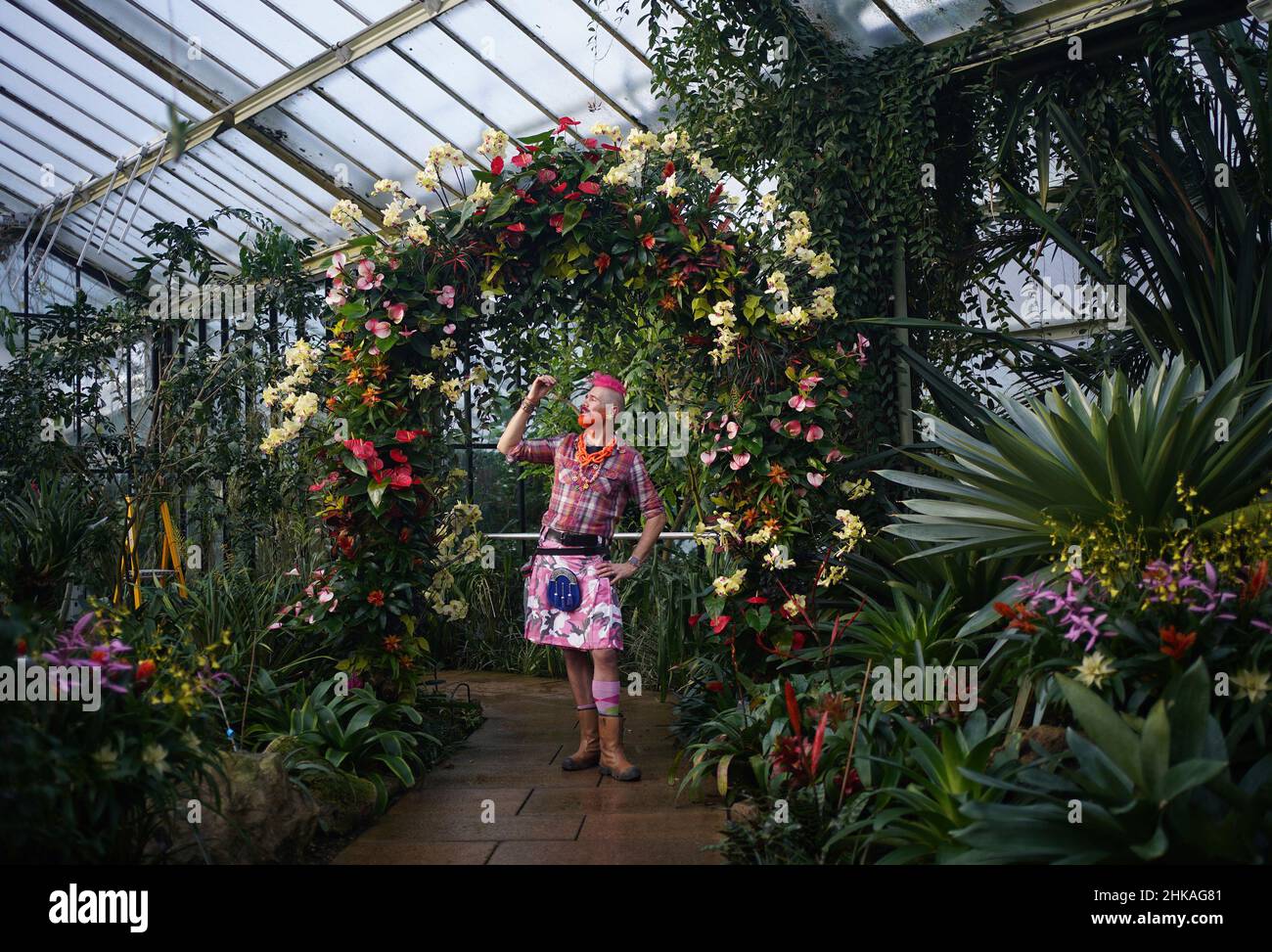 Henck Roling, in-house florist at Kew, poses with a display at the Kew ...