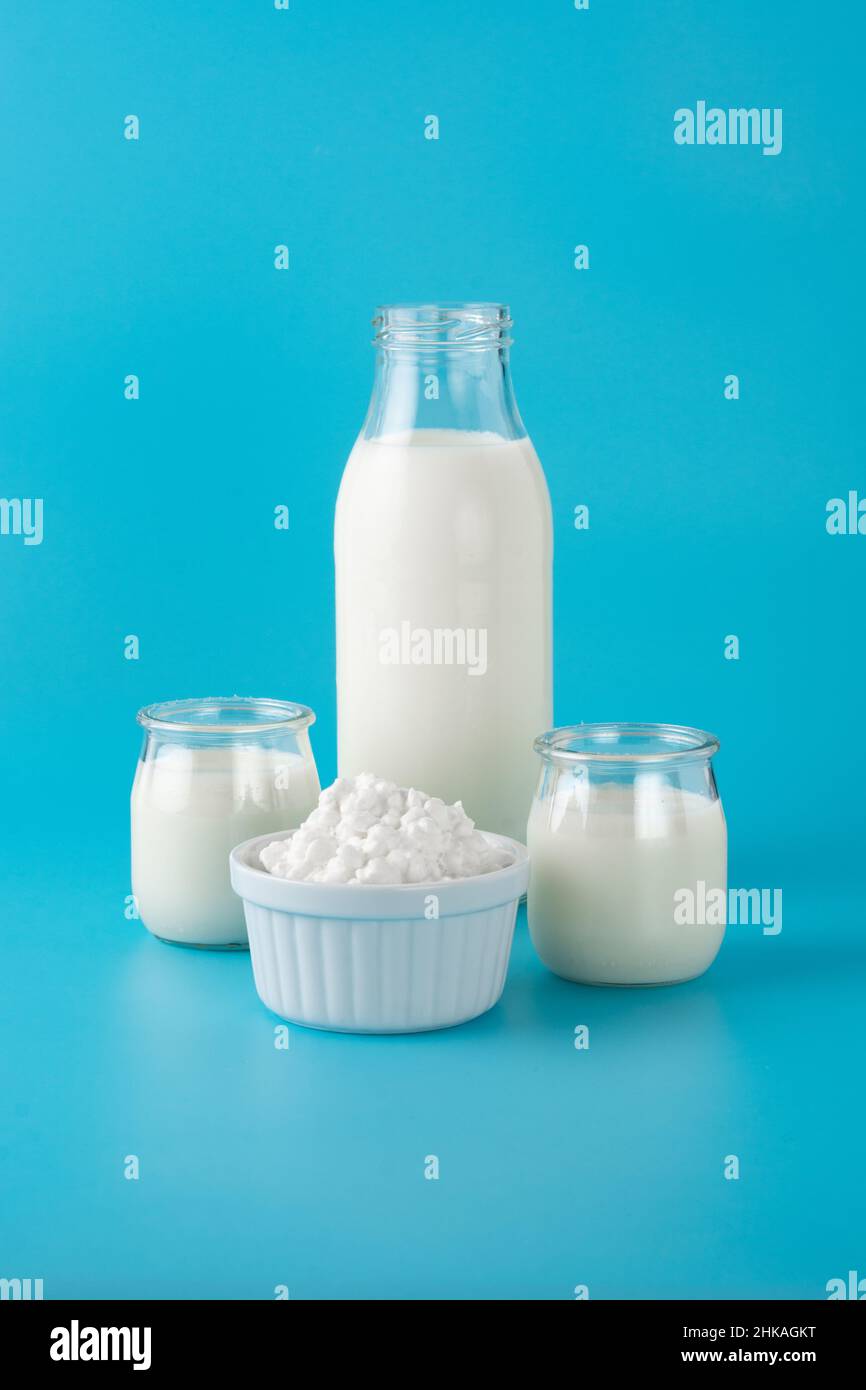Milk kefir drink on blue background.Liquid and fermented milk product ...