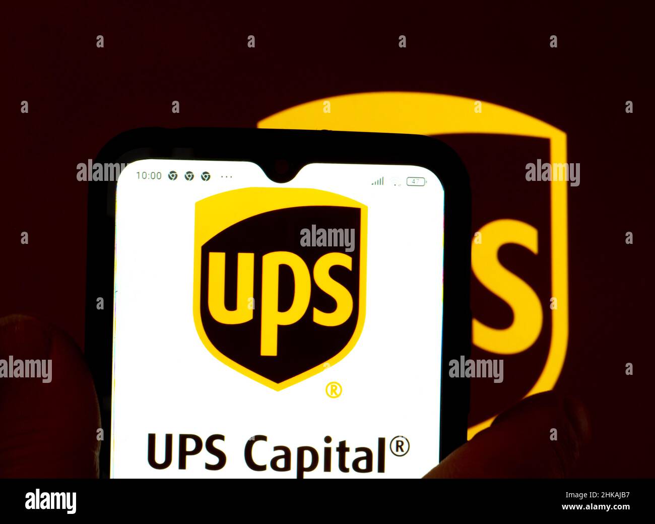 In this photo illustration, the UPS‎ Capital logo is displayed on a ...
